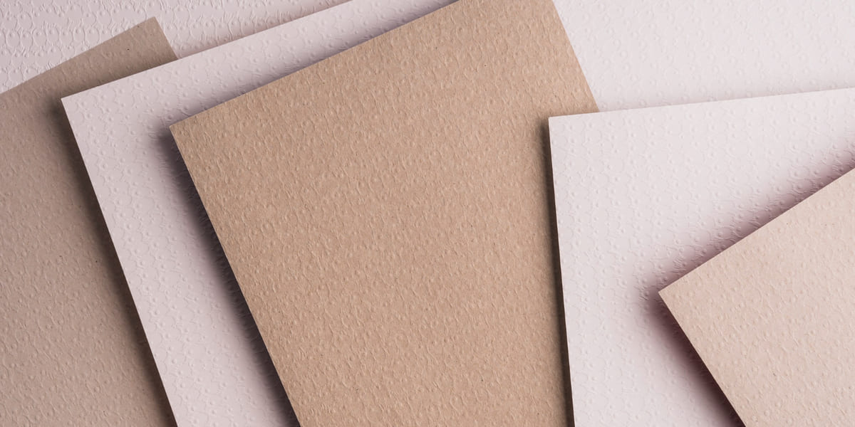 Descubre los Mejores Tipos de Cartón para Embalajes - BMS